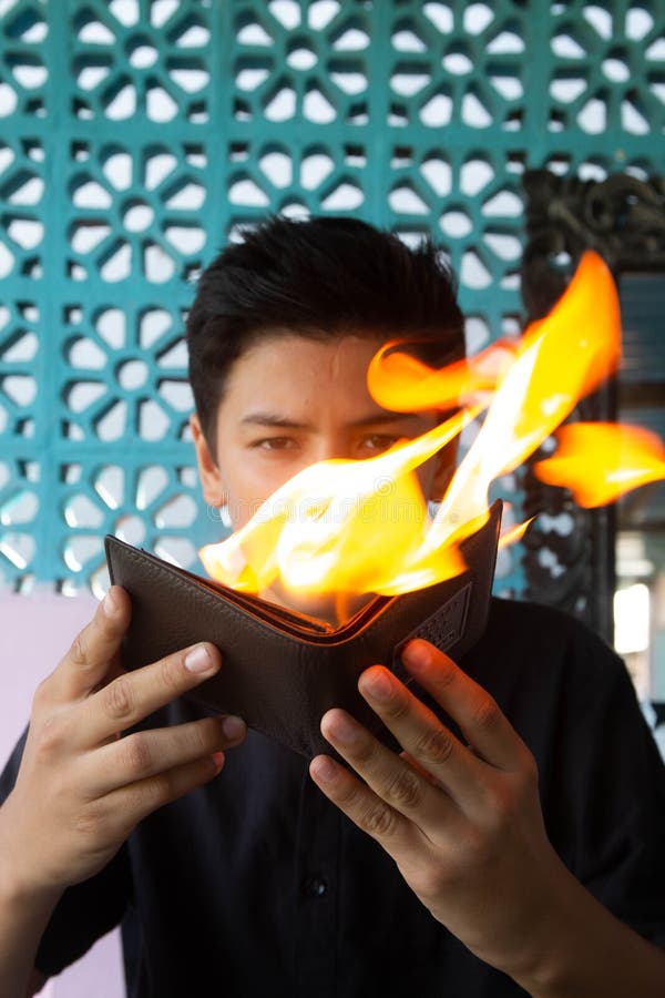 Professionals Fire Wallet - Trick by an Asian Male Stock Image - Image ...