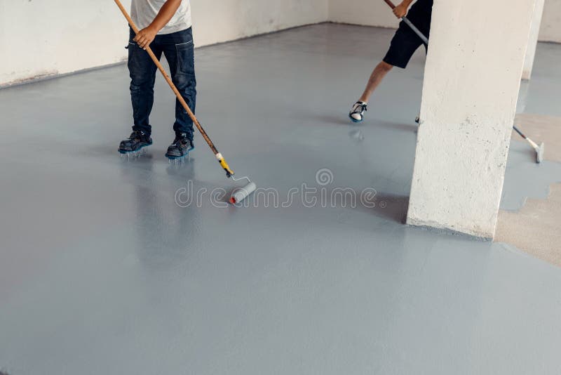 Professionals in the Installation of Epoxy Resin Floors Apply a Non ...