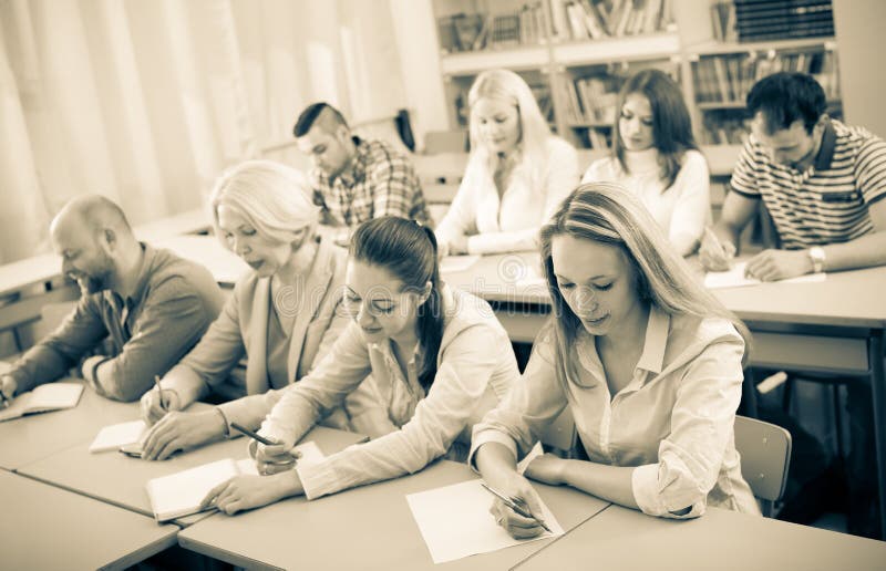 Professionals Taking Notes at Training Session Stock Photo - Image of ...