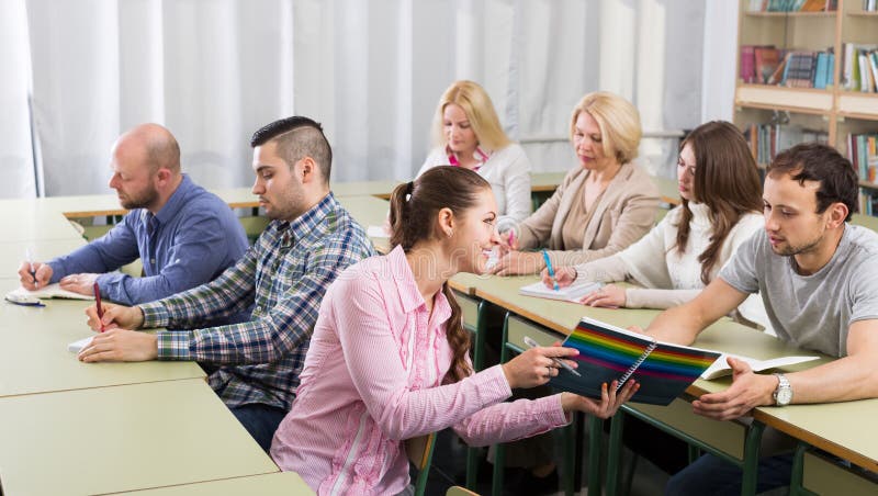 Professionals Taking Notes at Training Session Stock Photo - Image of ...