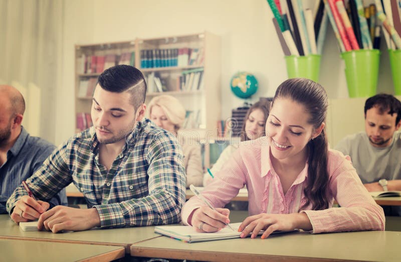 Professionals Taking Notes at Training Session Stock Photo - Image of ...