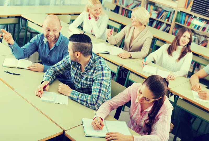 Professionals Taking Notes at Training Session Stock Photo - Image of ...