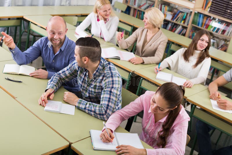 Professionals Taking Notes at Training Session Stock Photo - Image of ...