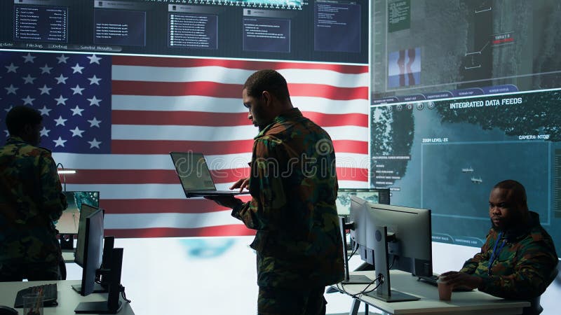 Professionals in US Military Uniforms Operate Computers and Big Screen ...