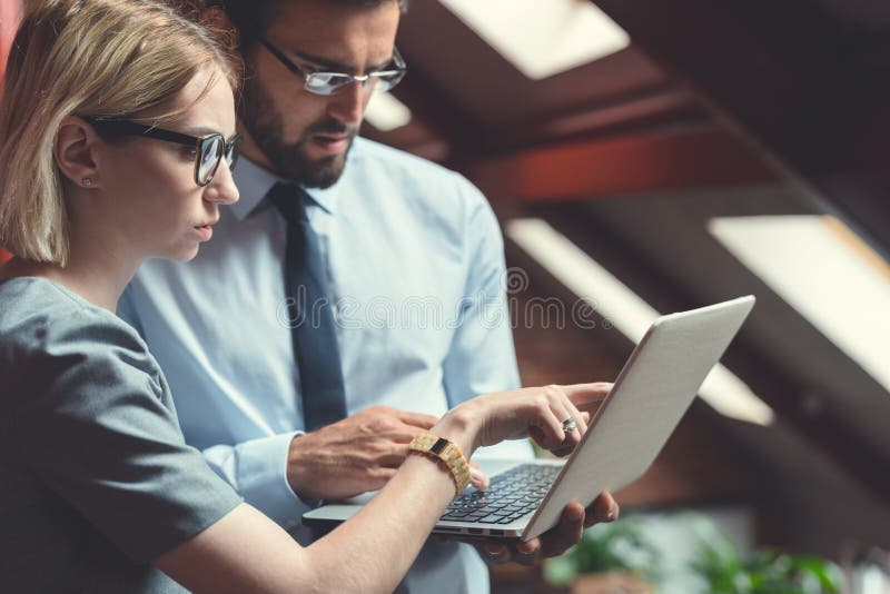 Professionals at work stock image. Image of casual, team - 107857949