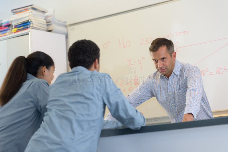 Professor Debating with Students Stock Image - Image of blank, looking ...