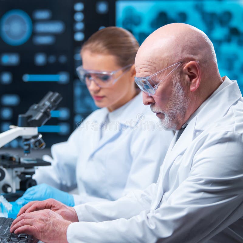 Professor and Doctor Work in a Modern Scientific Laboratory Using ...