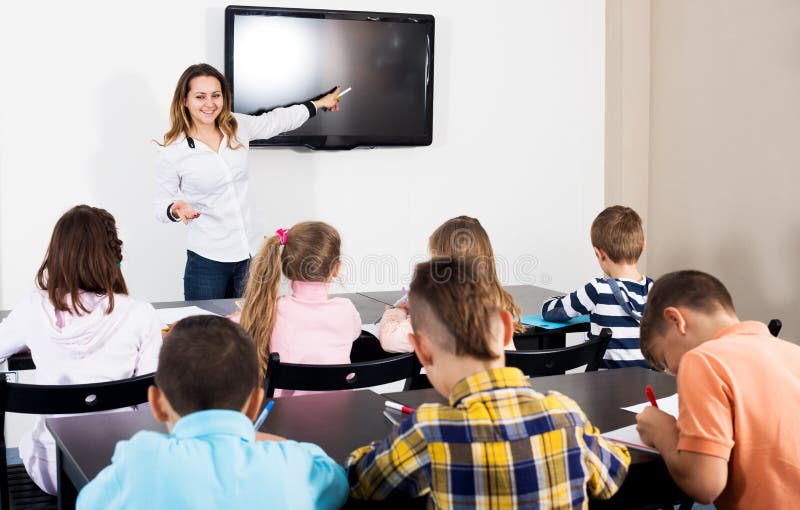 Professor and Elementary Age Children Stock Image - Image of grade ...