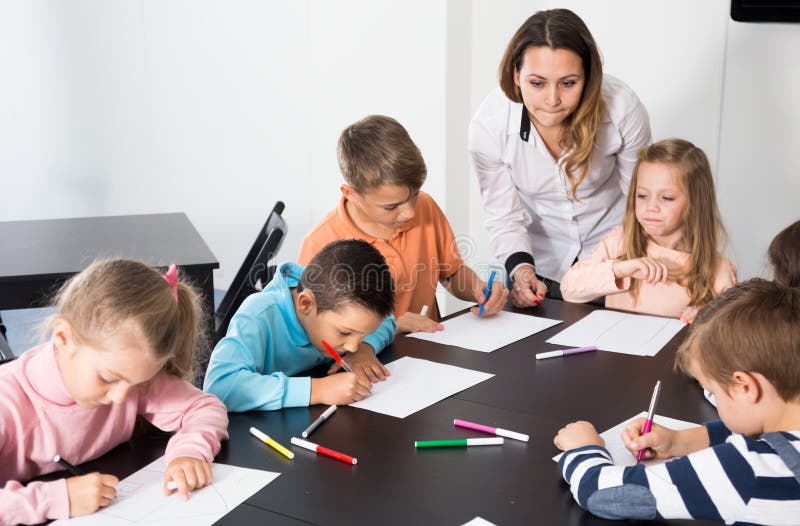 Professor and Elementary Age Children Stock Image - Image of grade ...