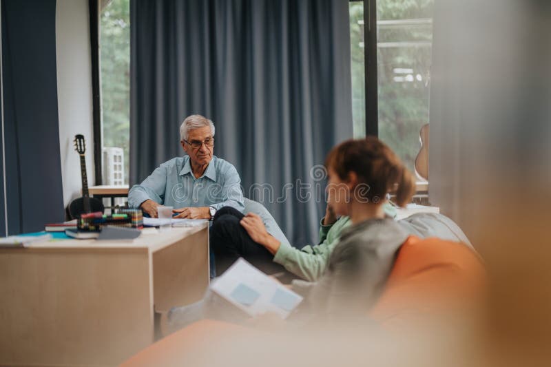 Professor Engaging with Students in an Informal Meeting Stock Image ...