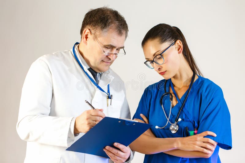 The Professor Explains To the Young Doctor How To Act Stock Image ...