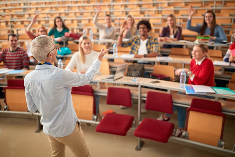 Professor Holding Lecture To a Multi Ethnic of Students Stock Photo ...