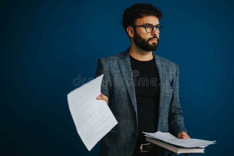 Professor Holding Papers while Preparing for an Academic Lecture Stock ...