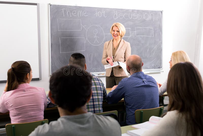 Professor Lecturing Students Stock Photo - Image of adults, ordinary ...
