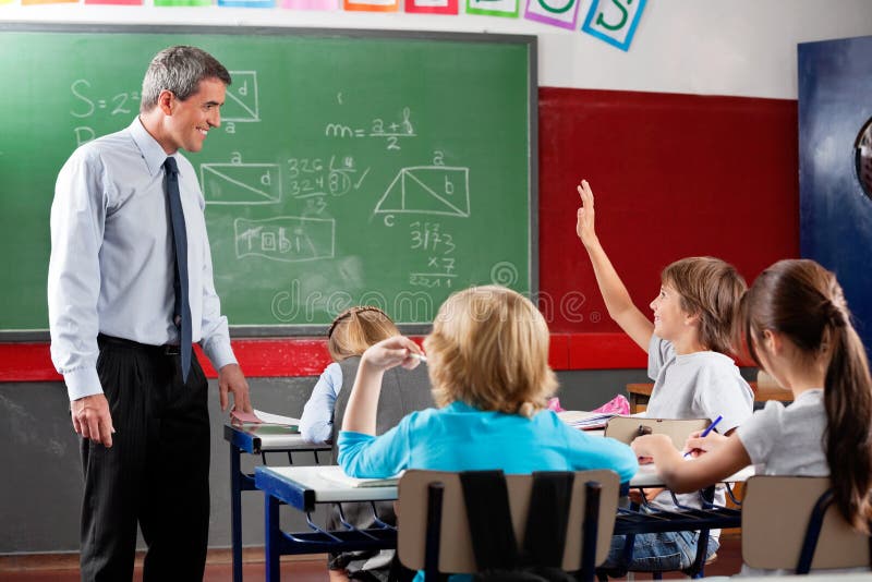 Professor Looking at Schoolboy Raising Hand Stock Image - Image of male ...