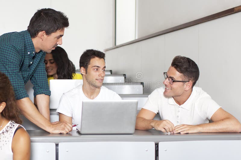 Professor with Male Students Stock Image - Image of cooperation ...