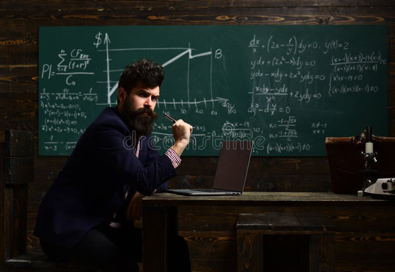 Professor and School Student at Classroom in School. Planning. Workshop ...