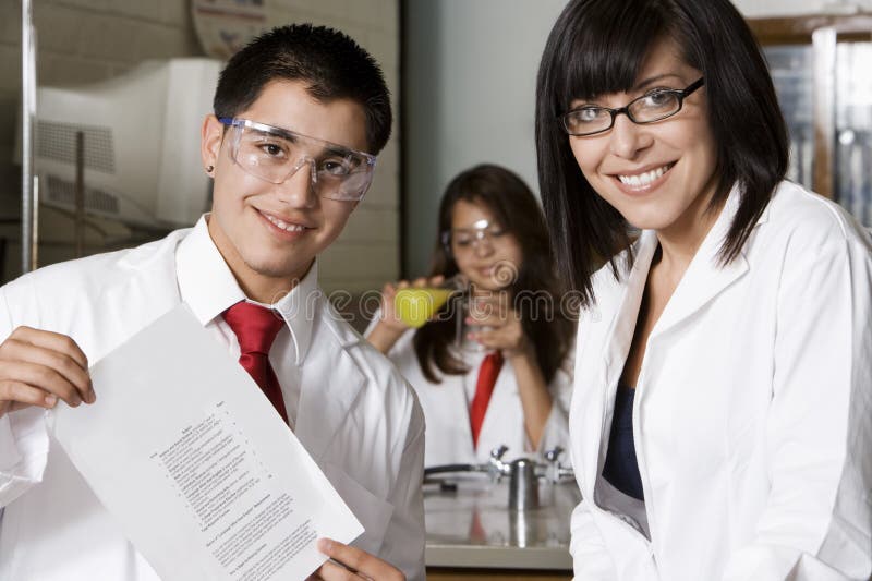 Professor with Student Holding Curriculum Paper in Lab Stock Image ...