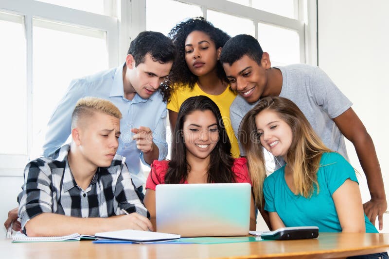 Professor Teaching Web Design with Group of Students Stock Photo ...