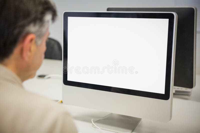 Professor using computer stock image. Image of mature - 69799399