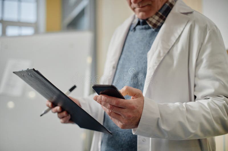 Professor Using Smartphone in College Stock Image - Image of mobile ...