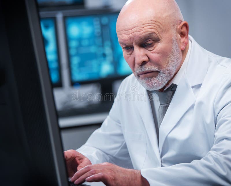 Professor Works in a Modern Scientific Laboratory Using Equipment and ...