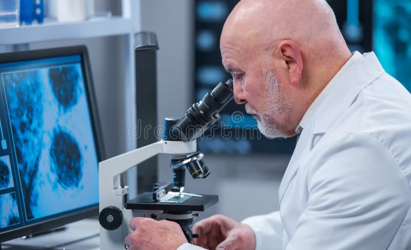 Professor Works in a Modern Scientific Laboratory Using Equipment and ...