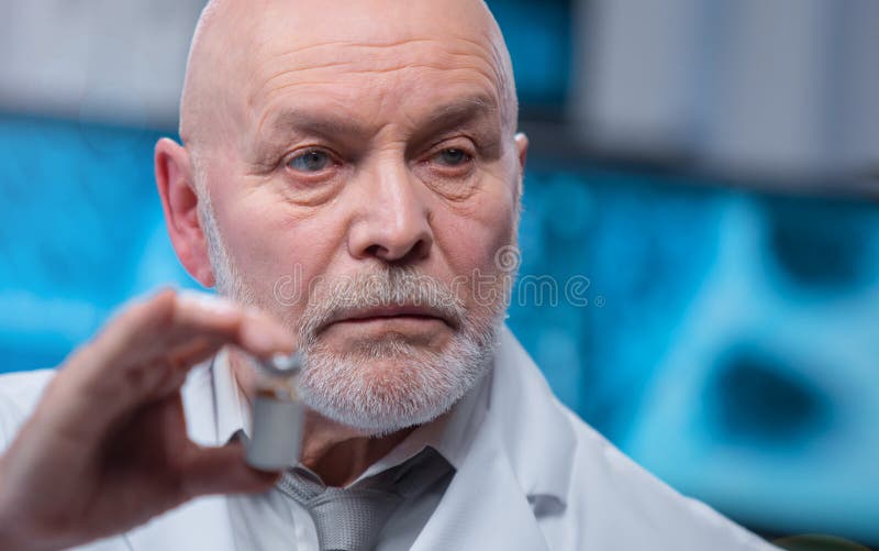 Professor Works in a Modern Scientific Laboratory Using Equipment and ...