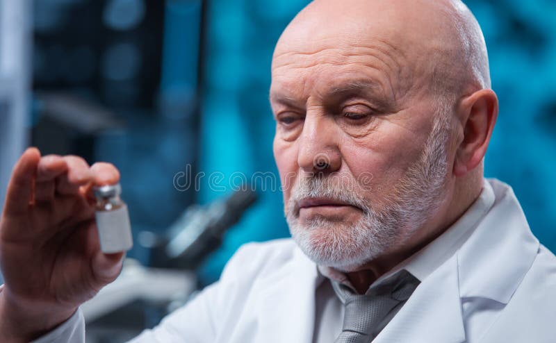 Professor Works in a Modern Scientific Laboratory Using Equipment and ...