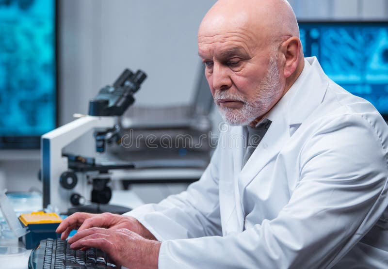 Professor Works in a Modern Scientific Laboratory Using Equipment and ...