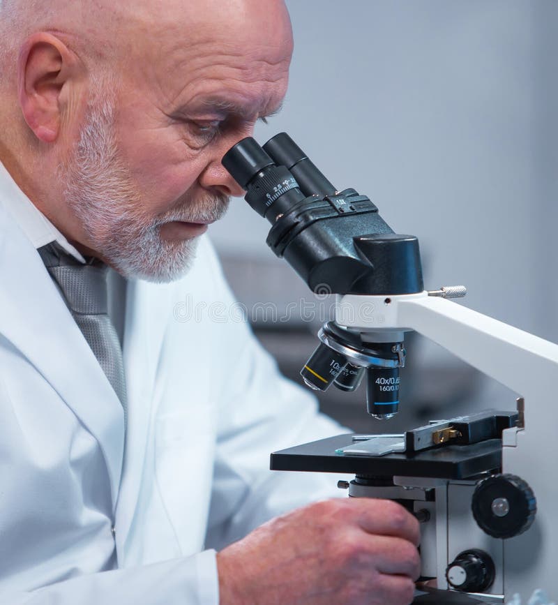 Professor Works in a Modern Scientific Laboratory Using Equipment and ...