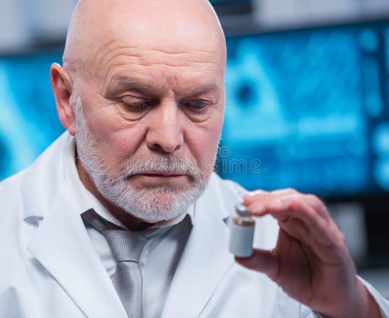 Professor Works in a Modern Scientific Laboratory Using Equipment and ...