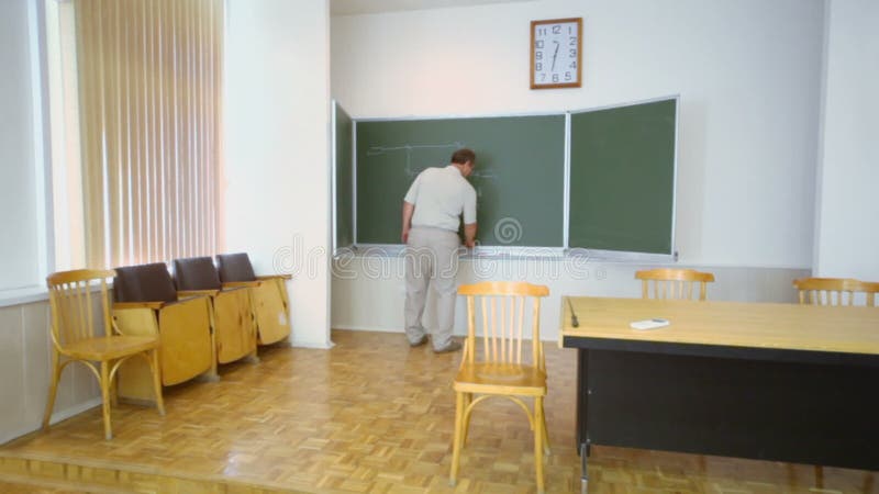 Professor Writes Formulas on Board with Scheme and Stock Video - Video ...