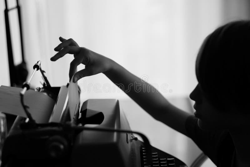 Profile of a Child Typing on an Typewriter Stock Image - Image of ...