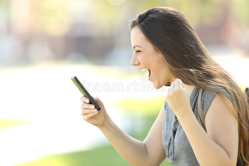 Profile of an Excited Woman Using a Phone Stock Image - Image of girl ...