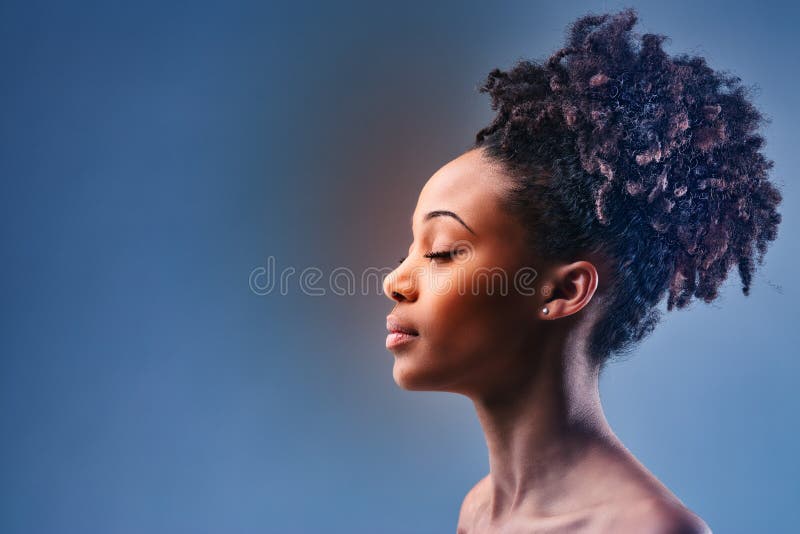 Profile Head And Shoulders Portrait Of A Young Woman Stock Image