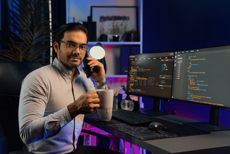 Profile it Looking Camera Holding Coffee Cup at Neon Cyber Office ...