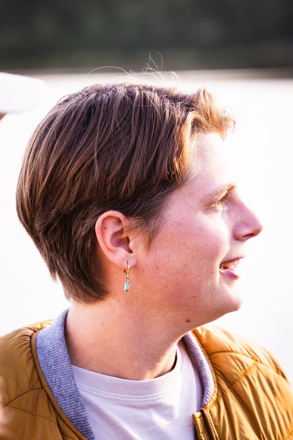 Profile Portrait of Androgynous Individual in Natural Light Stock Image ...