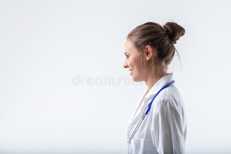 Profile Portrait of Female Doctor Looking Towards Copyspace Stock Photo ...