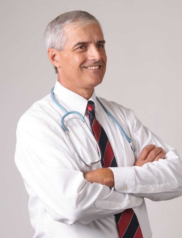 Profile Portrait of Smiling Middle Aged Doctor Stock Image - Image of ...