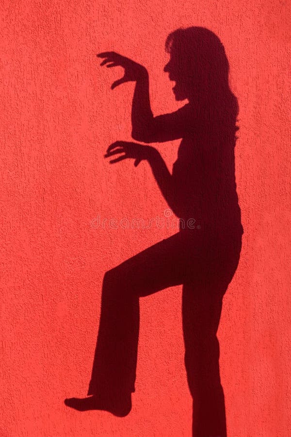 Profile Shadow of Woman on Red Wall Stock Photo - Image of hands ...