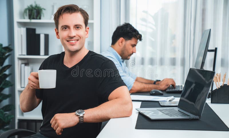 Profile of Smiling Freelancer Looking at Camera with Coffee Cup ...