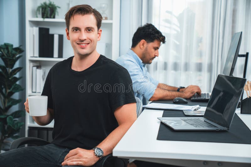 Profile of Smiling Freelancer Looking at Camera with Coffee Cup ...