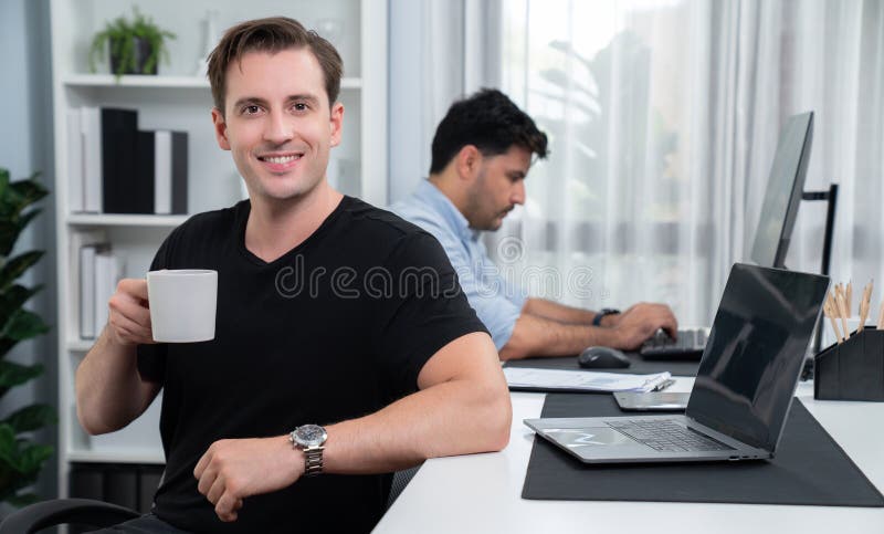 Profile of Smiling Freelancer Looking at Camera with Coffee Cup ...