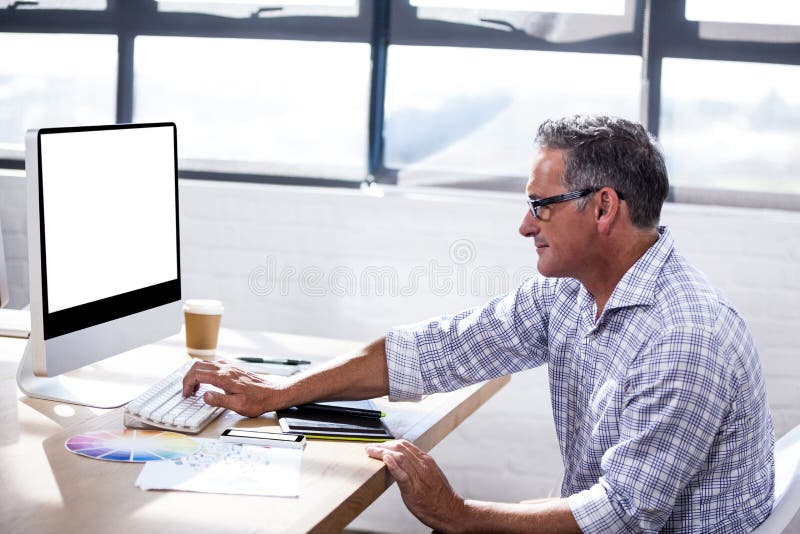 Profile View of Businessman Typing on His Keyboard Stock Photo - Image ...