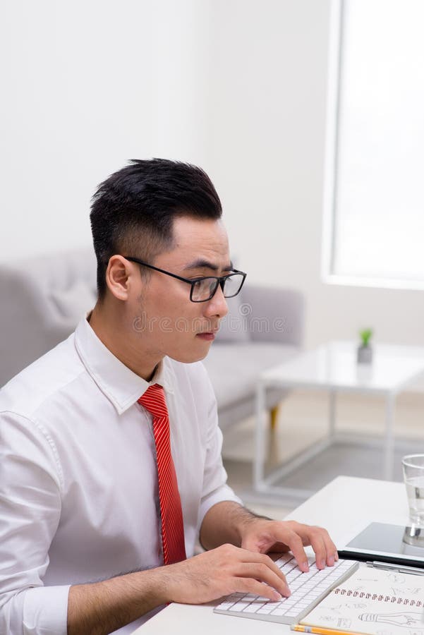 Profile View of a Handsome Young Man Doing Some Meditation Exercises ...