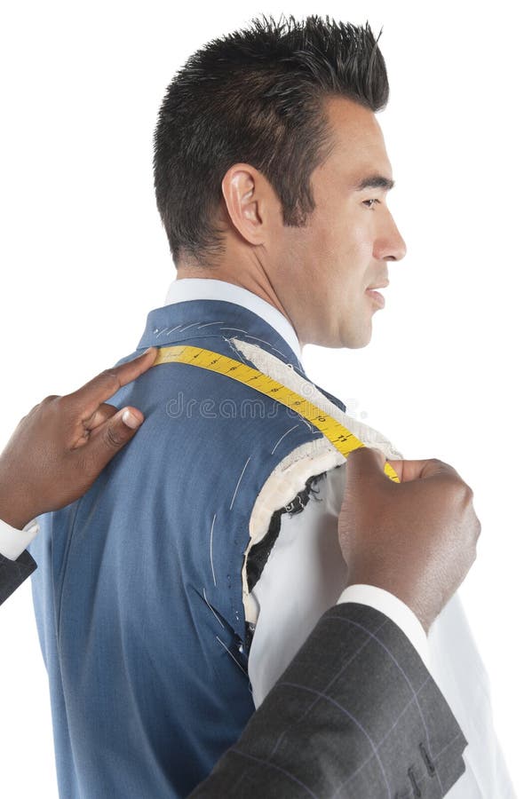 Man Getting Measured by a Tailor on a White Background Stock Photo ...