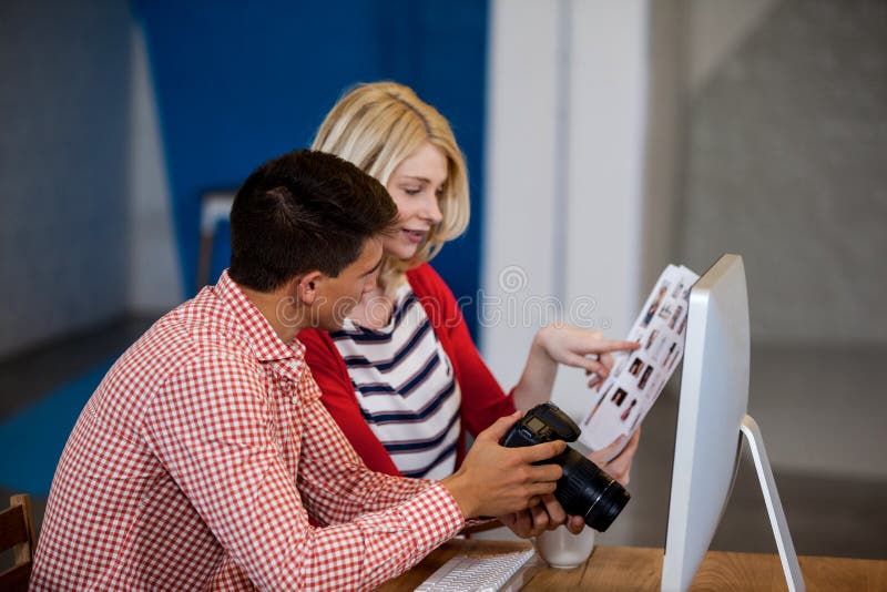 Profile View of Photographer Talking with His Colleague Stock Image ...