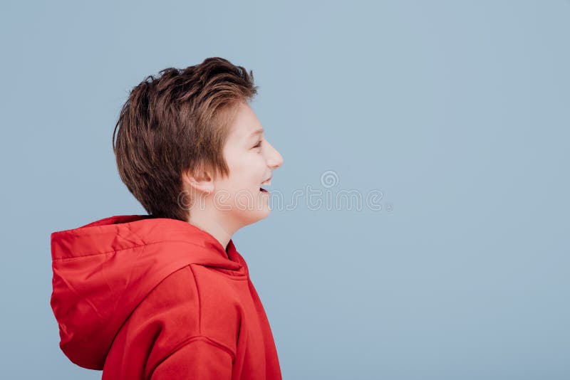 Profile View, Smiling Boy in Red Sweatshirt Stock Photo - Image of ...
