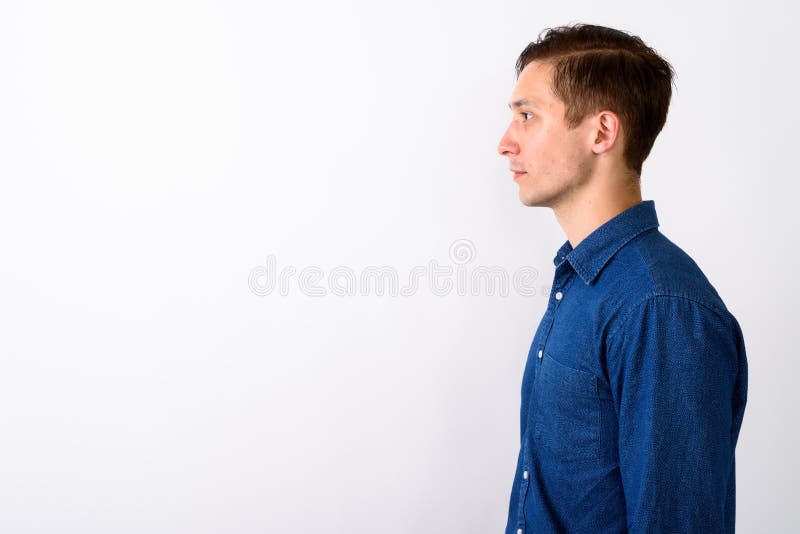 Profile View of Young Handsome Man Against White Background Stock Image ...